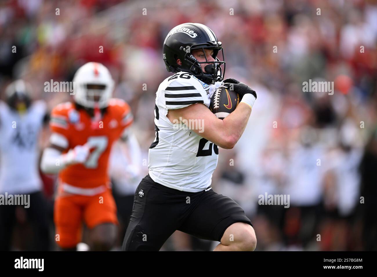 Iowa State running back Carson Hansen (26) scores a touchdown on a 30 ...