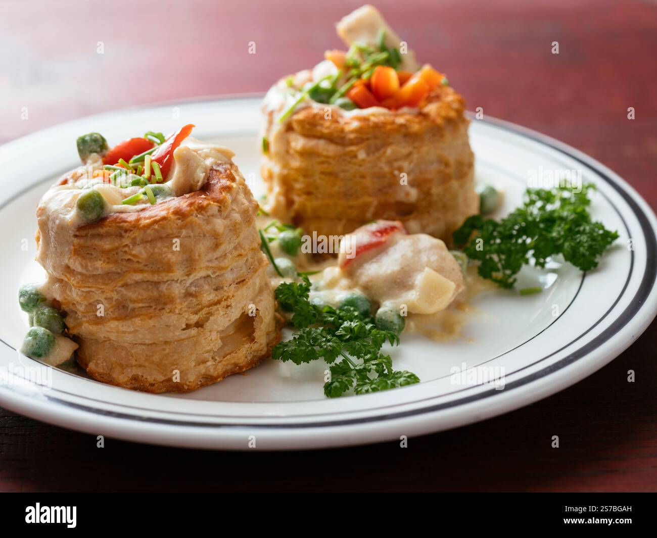 Vegan puff pastry shells filled with a creamy chickun, peas and bell ...