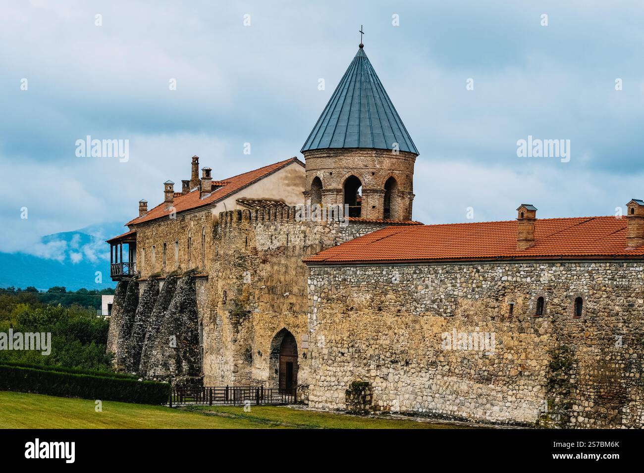 Ancient stone walls and a bell tower of Alaverdi Monastery in Kakheti ...