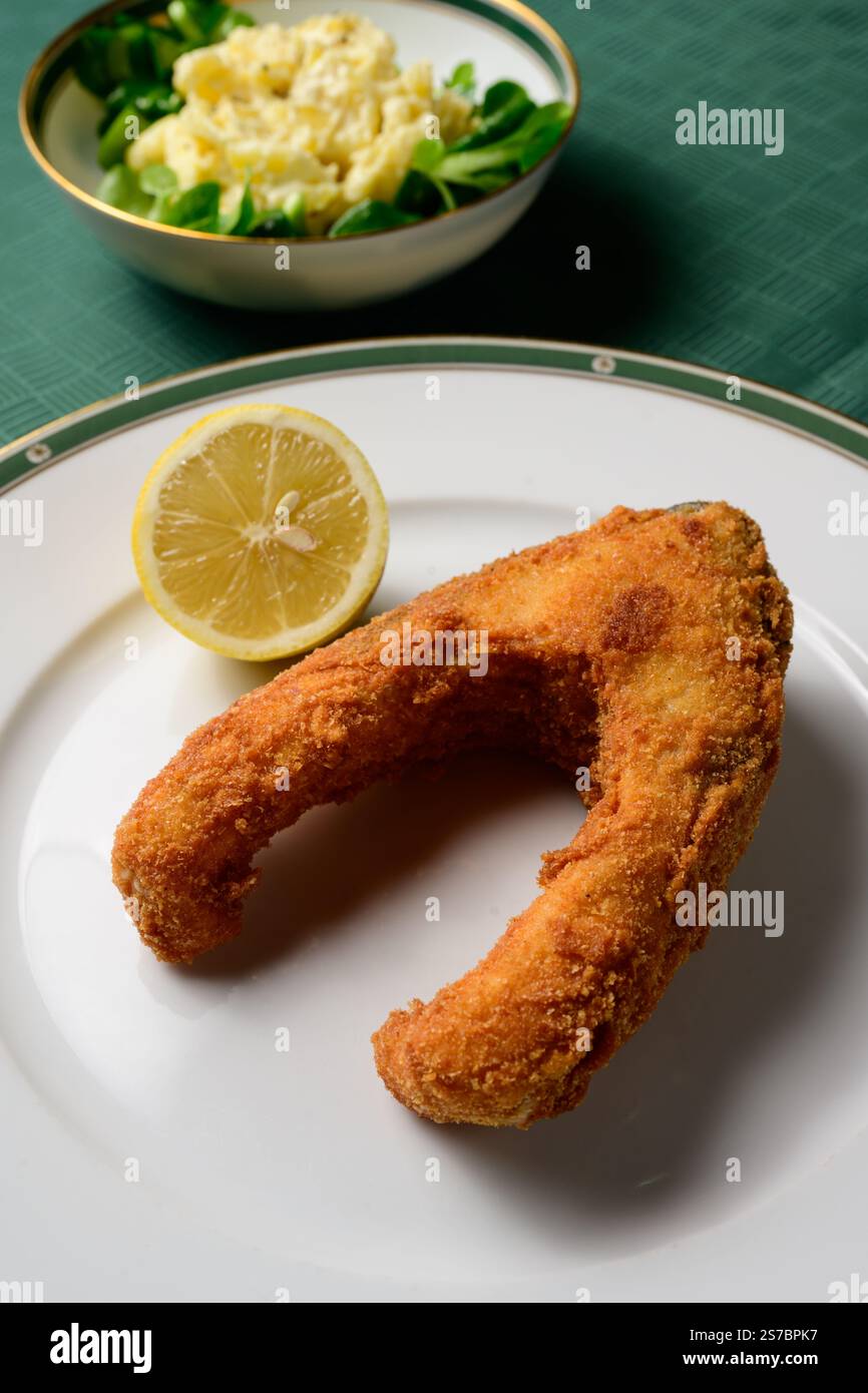 Breaded and Deep Fried Carp Steak with Mayonnaise Potato Salad and a ...
