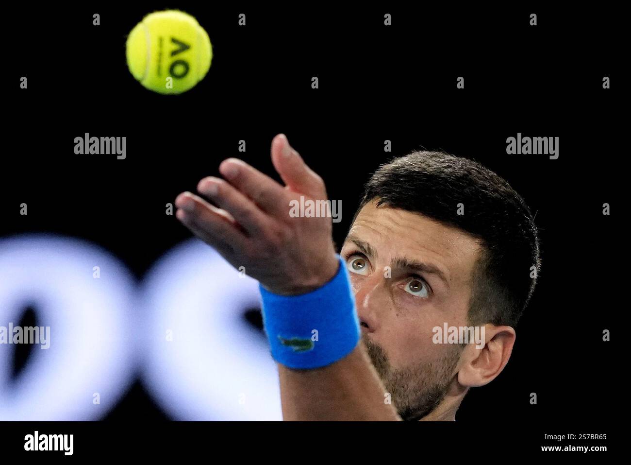 Novak Djokovic of Serbia serves to Jiri Lehecka of the Czech Republic ...