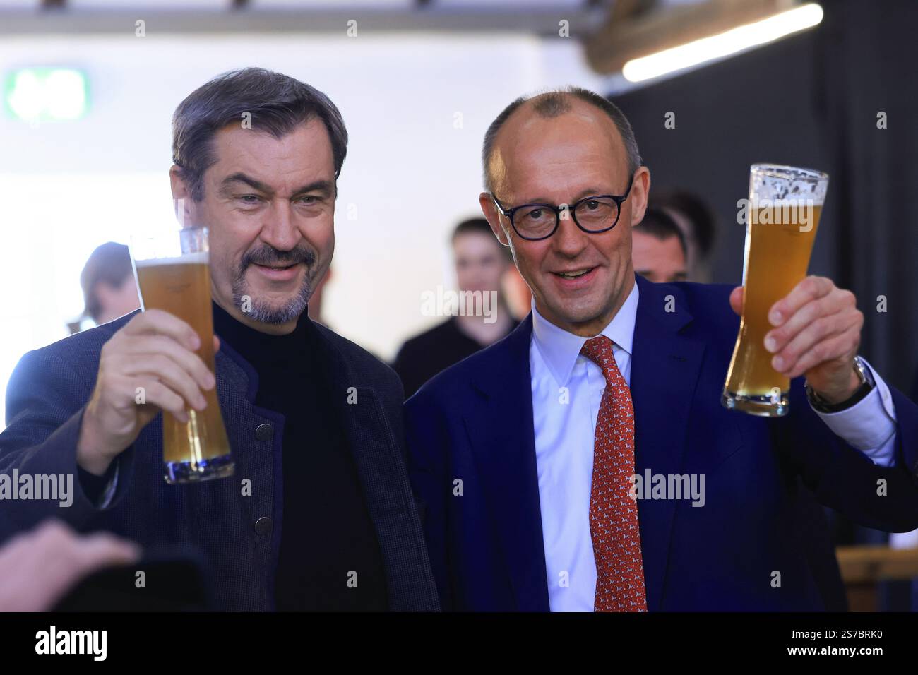 Brilon, Germany. 19th Jan, 2025. Union chancellor candidate Friedrich Merz (r) and CSU leader ...