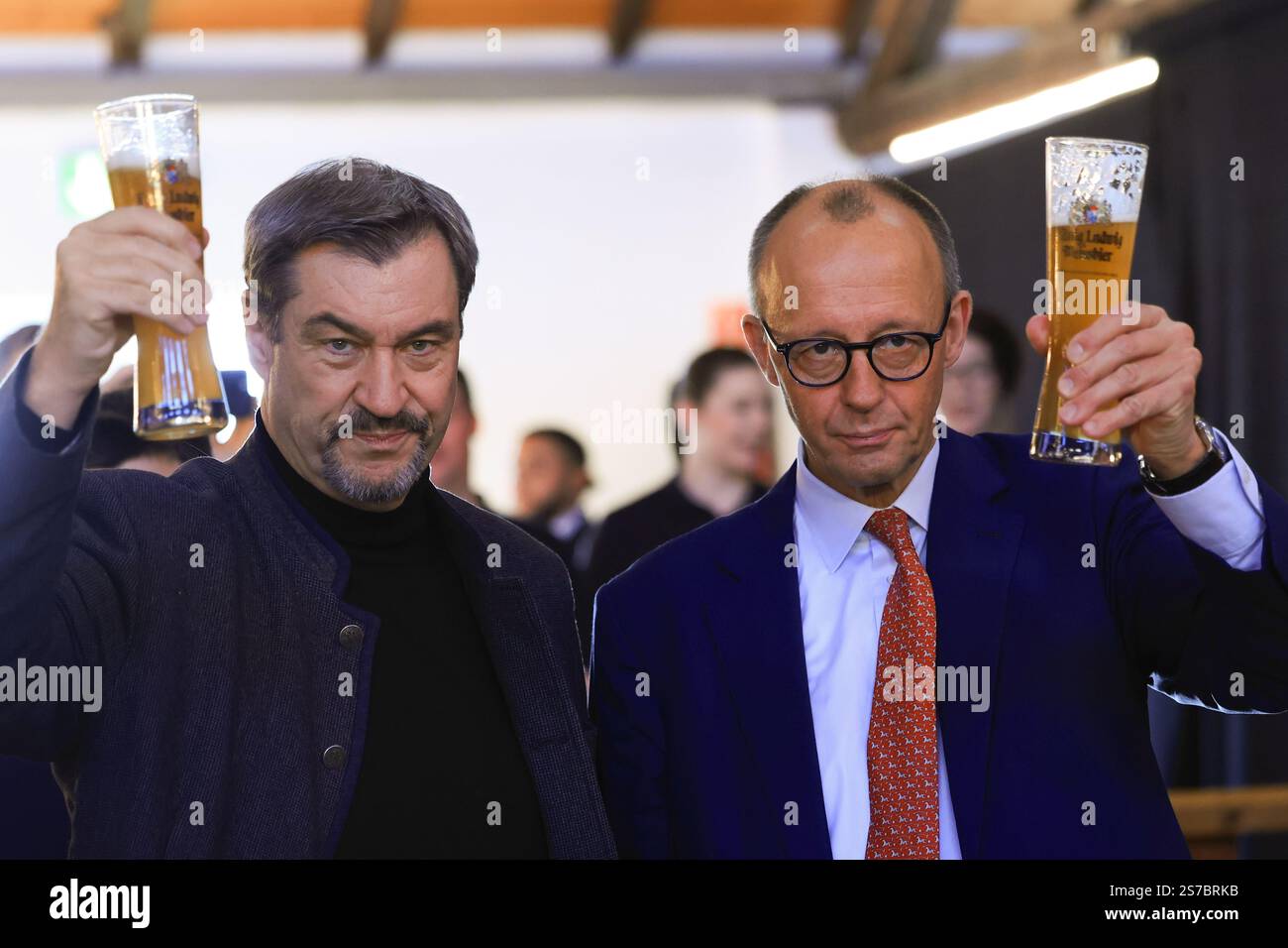 Brilon, Germany. 19th Jan, 2025. Union chancellor candidate Friedrich Merz (r) and CSU leader ...