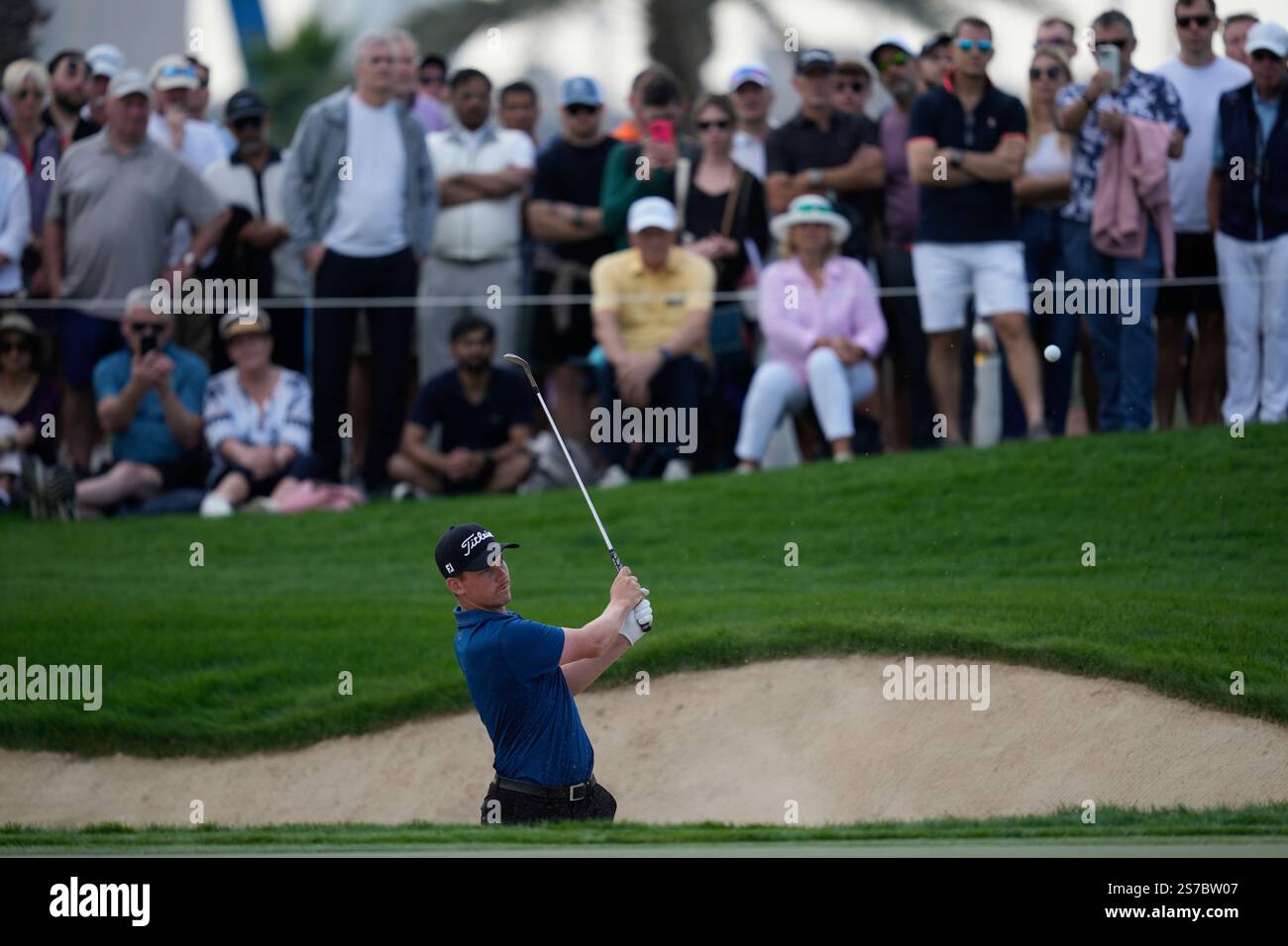 Daniel Hillier of New Zealand hits a shot from a bunker on the 8th hole ...
