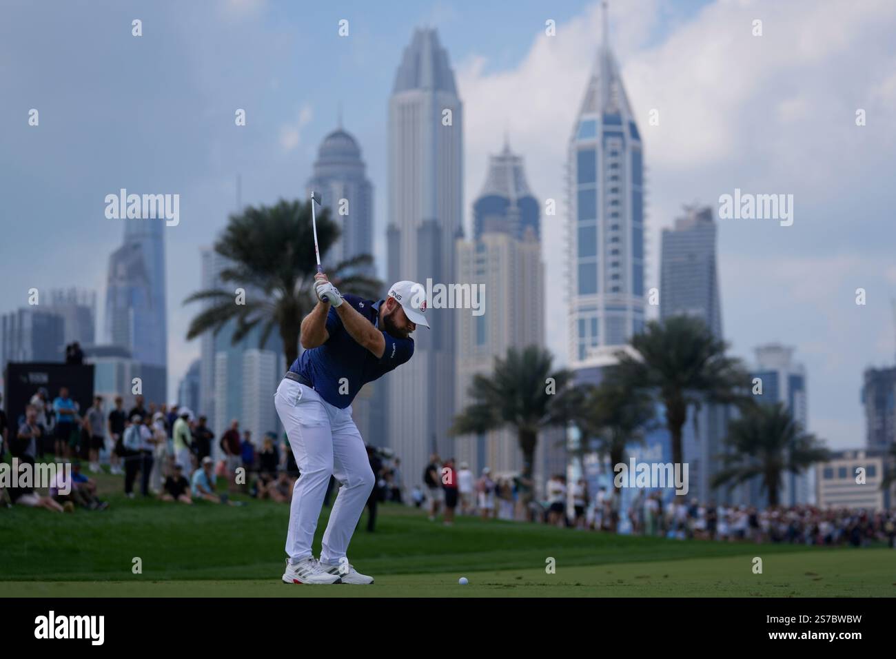Tyrell Hatton of England plays his second shot on the 8th hole during ...
