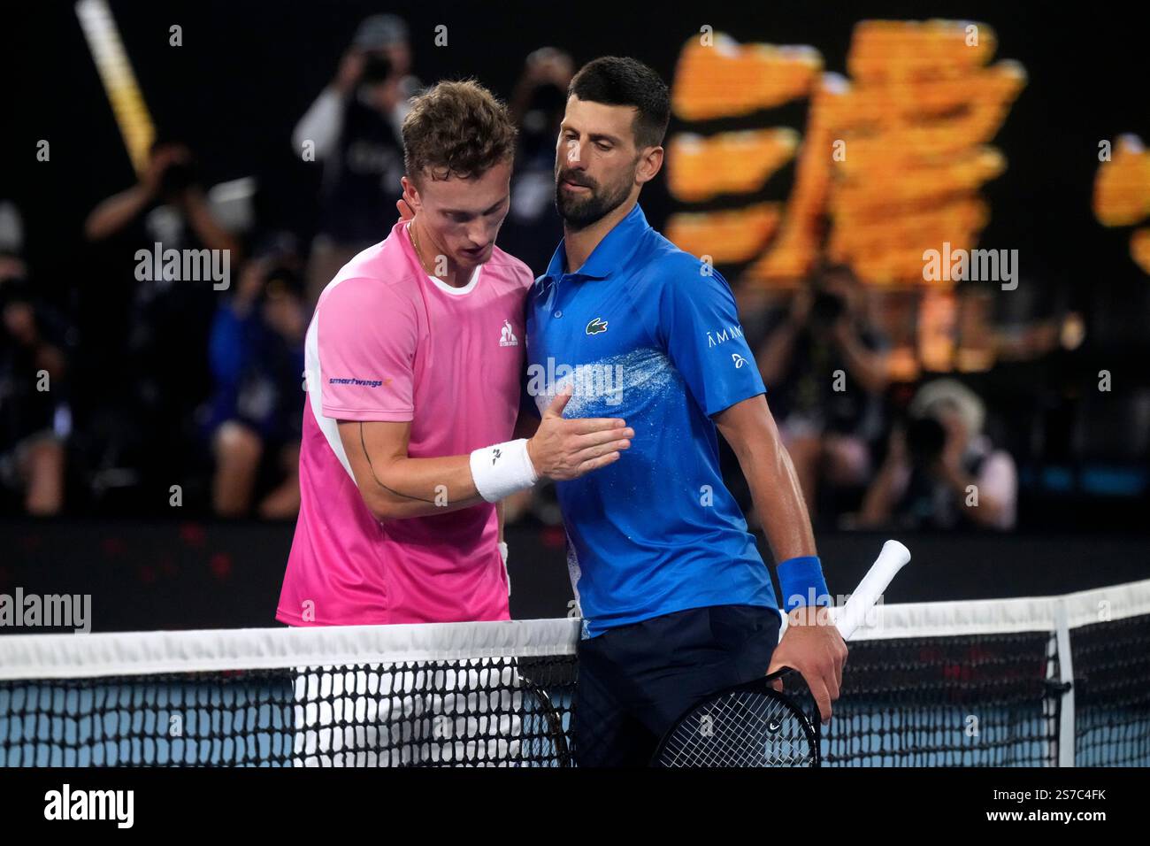 Novak Djokovic, right, of Serbia is congratulated by Jiri Lehecka of ...