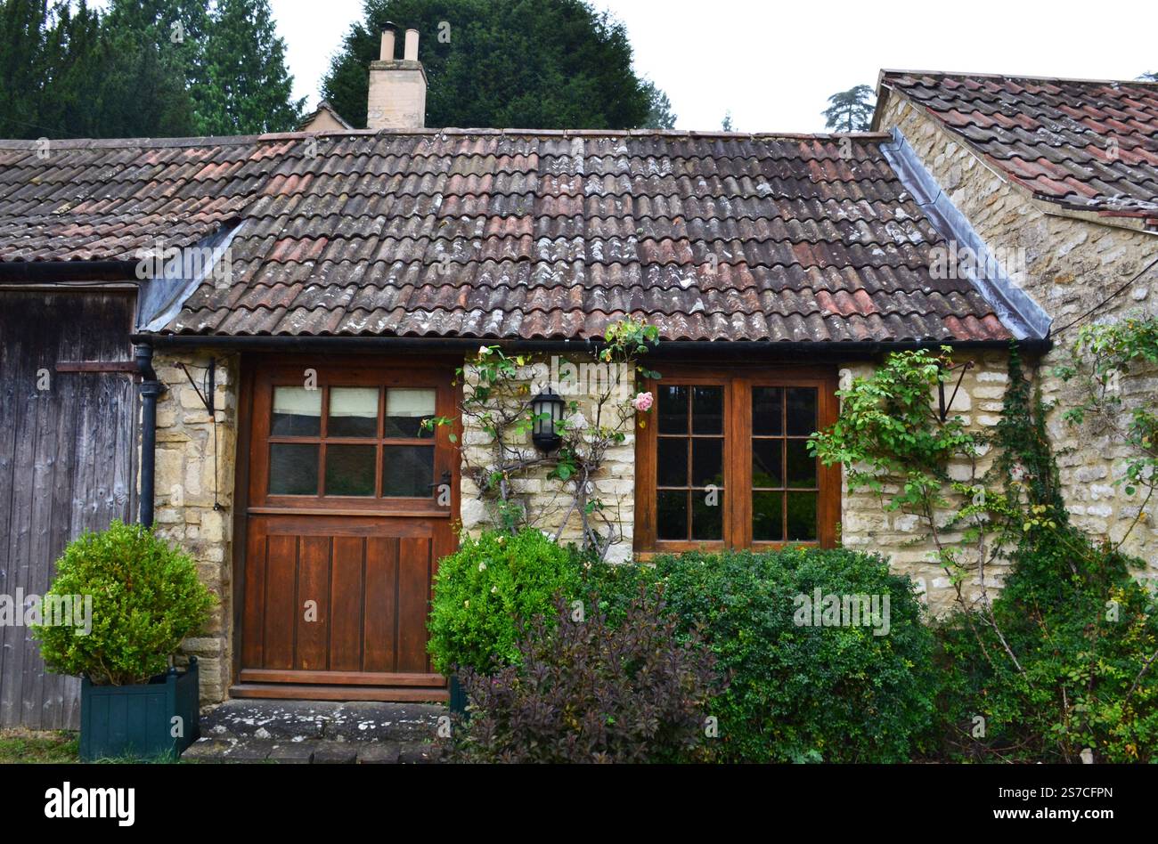 Park Lane typical English stone house with pointed roofs of dark tiles ...