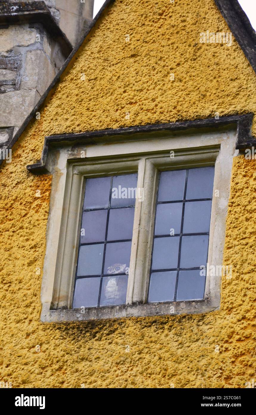 Close up picture of a traditional wooden window of an old rural cottage ...