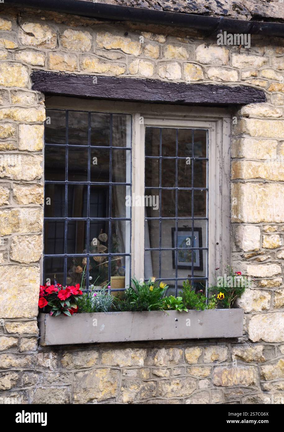 Close up picture of an old traditional wooden window of a rural cottage ...