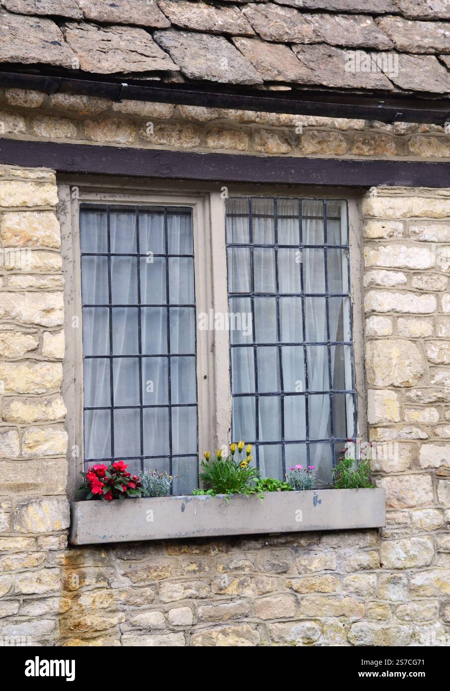 Close up picture of an old traditional wooden window of a rural cottage ...