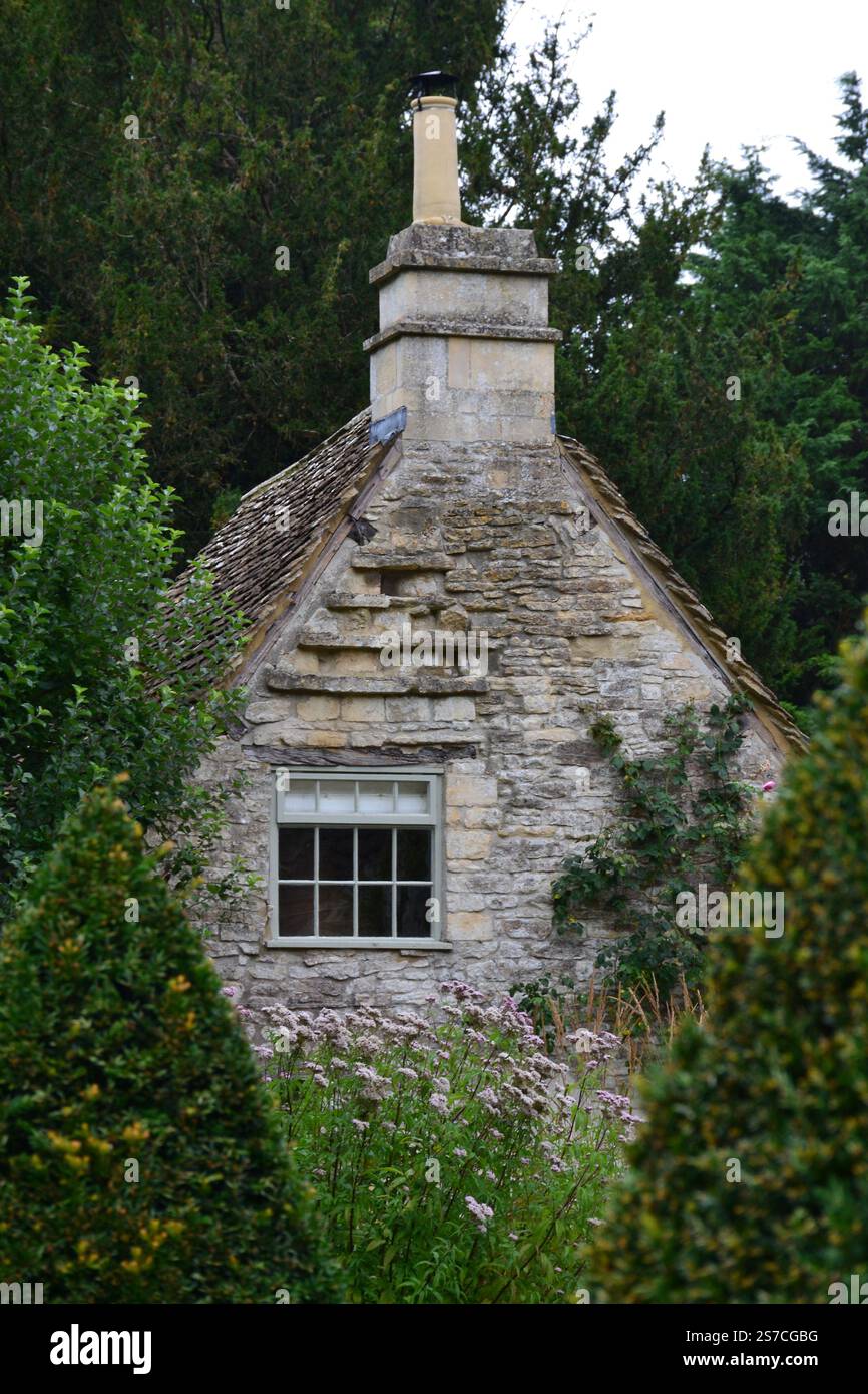 An old little stone cottage in Castle Combe, Cotswolds, Wiltshire ...