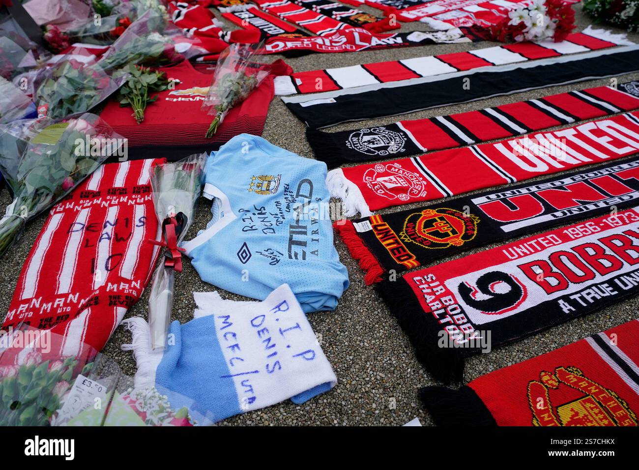 Manchester, UK. 19th Jan, 2025. Tributes left at the Trinity statue for ...