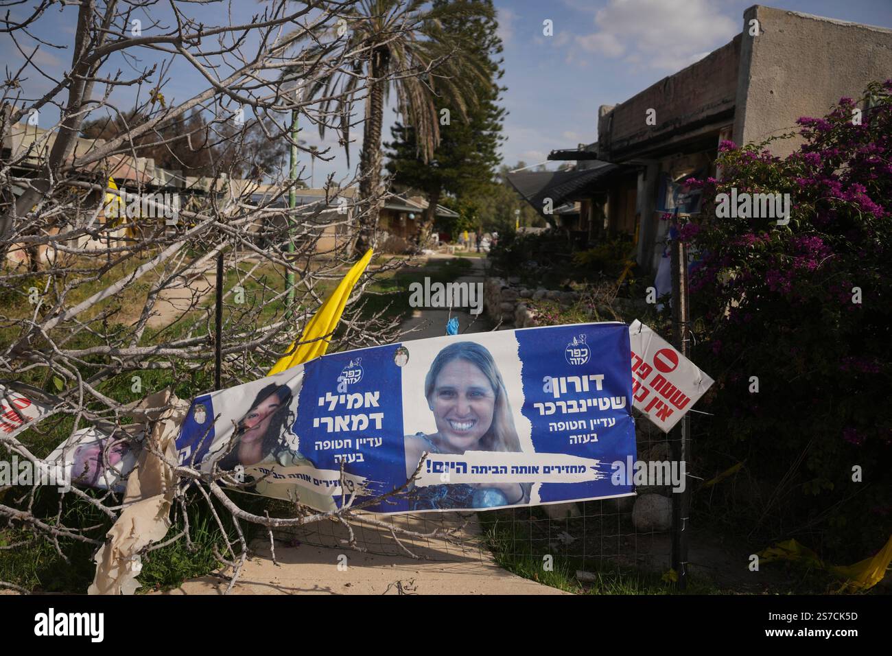 A picture of Israeli hostage Doron Steinbrecher, center, kidnapped by ...