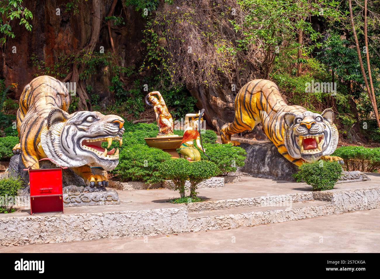 Sculptures of two colorful tigers in the Buddhist Tiger Cave Temple in ...