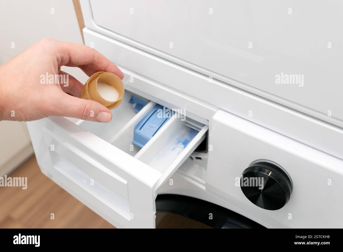 White washing machine in a utility room. Household chores concept ...