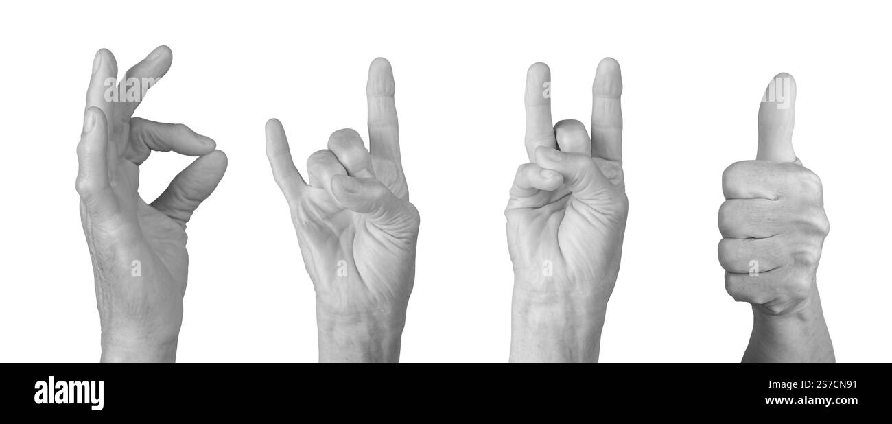 Elderly woman's hand showing rock horn gesture with thumb up, wrinkled ...