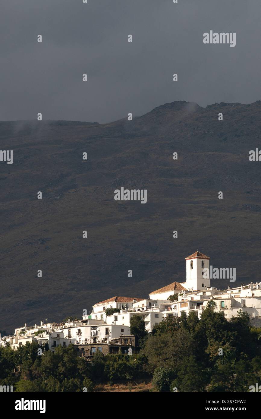 View of the white village of Capileira in the Alpujarra Region with the ...