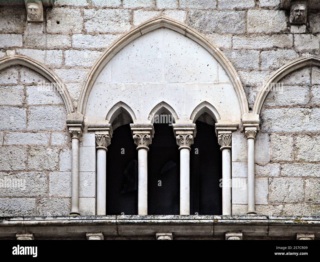 Stunning gothic window reveals intricate stonework and stained glass in ...