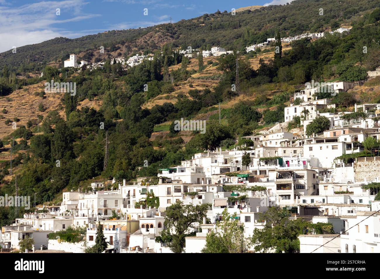 View of the white village of Pampaneira in the Alpujarra Region with ...