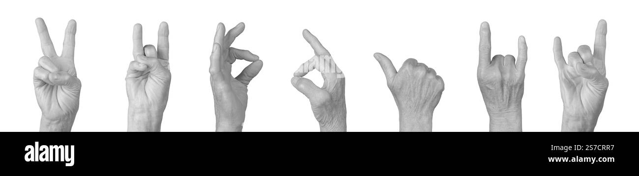 Elderly female hand showing gestures like peace, victory, and rock horn ...