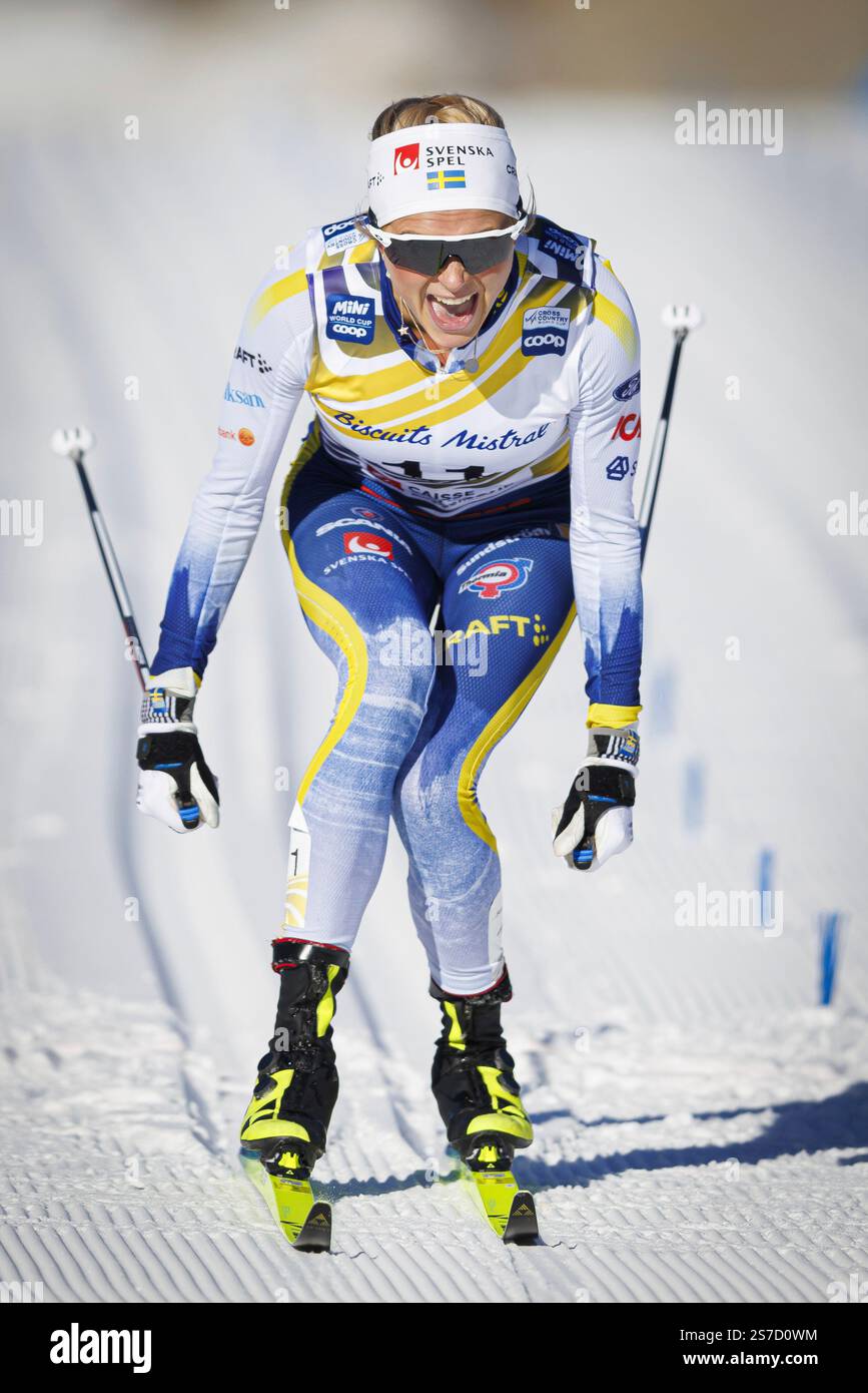 Winner Frida Karlsson from Sweden reacts on the finish line during the ...