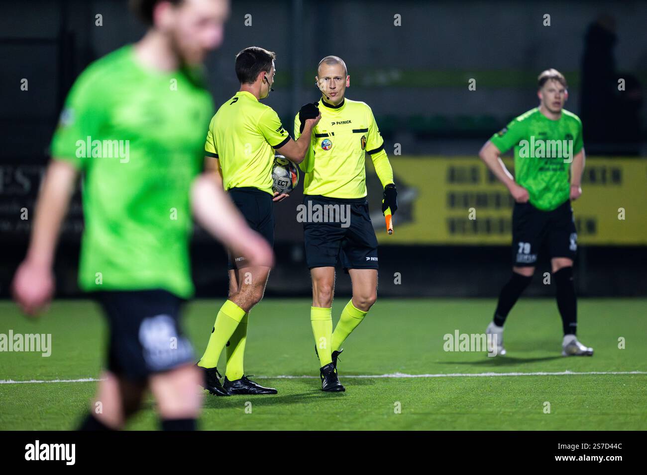 Ninove, Belgium. 18th Jan, 2025. referee Wouter Debusscher and assistant referee Tom De Roeck ...
