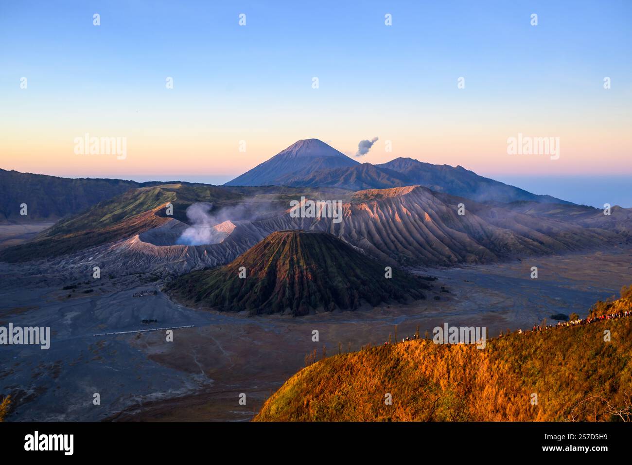 Aerial view of the smoking craters and the scenic beauty of the Bromo ...
