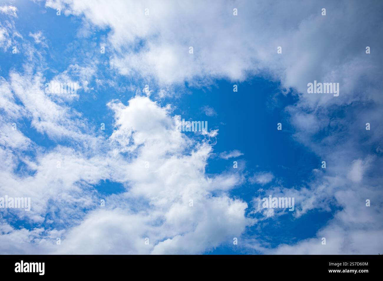 A serene, captivating cloudy sky showcases an expansive backdrop of ...