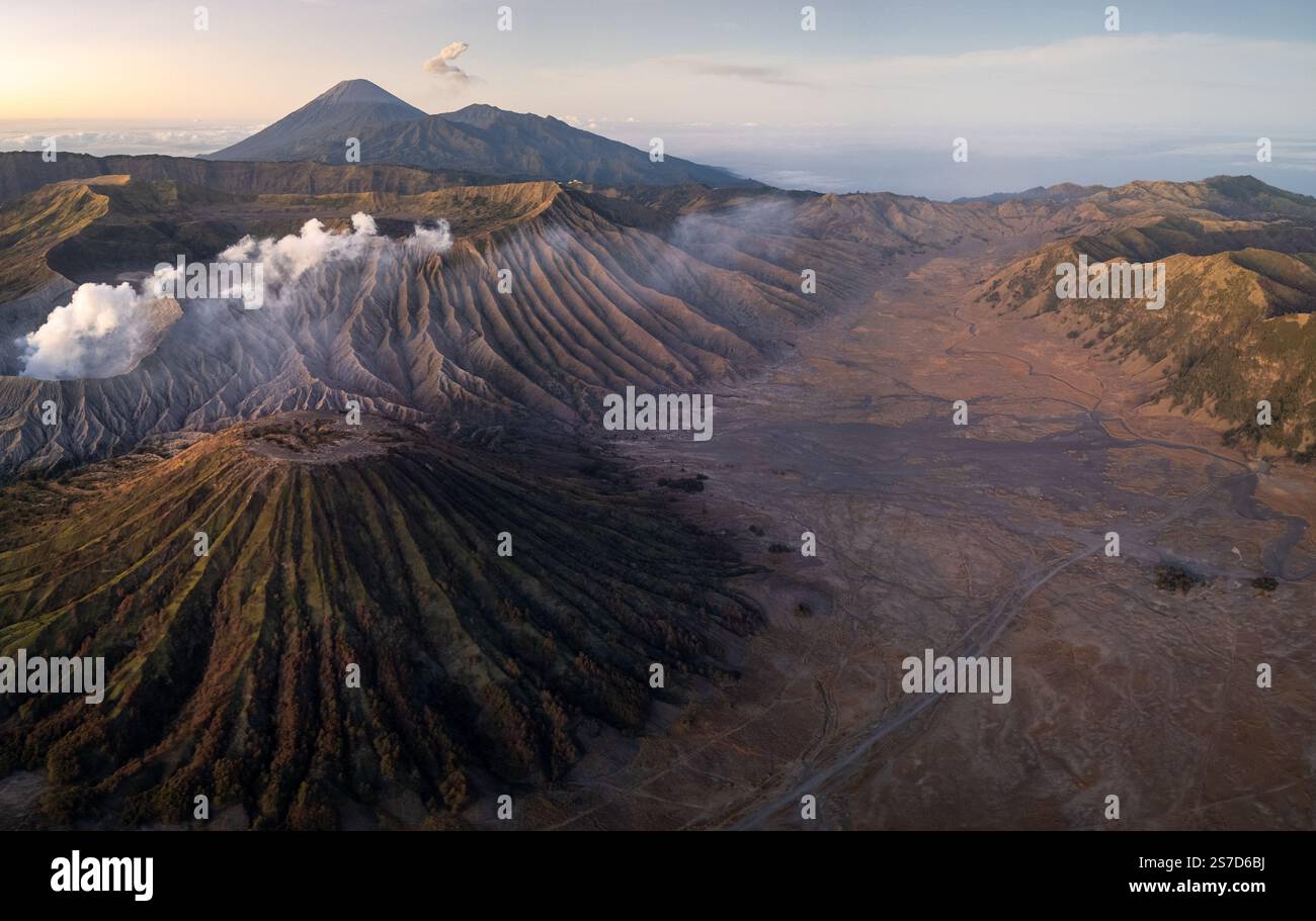 Aerial view of the smoking craters and the scenic beauty of the Bromo ...