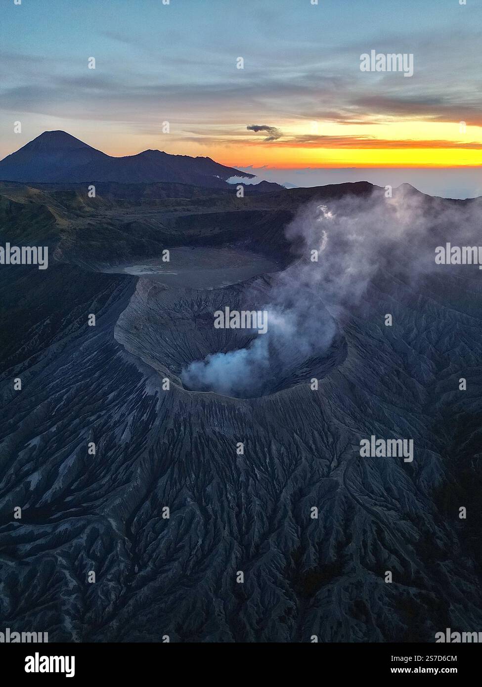 Aerial view of the smoking craters and the scenic beauty of the Bromo ...