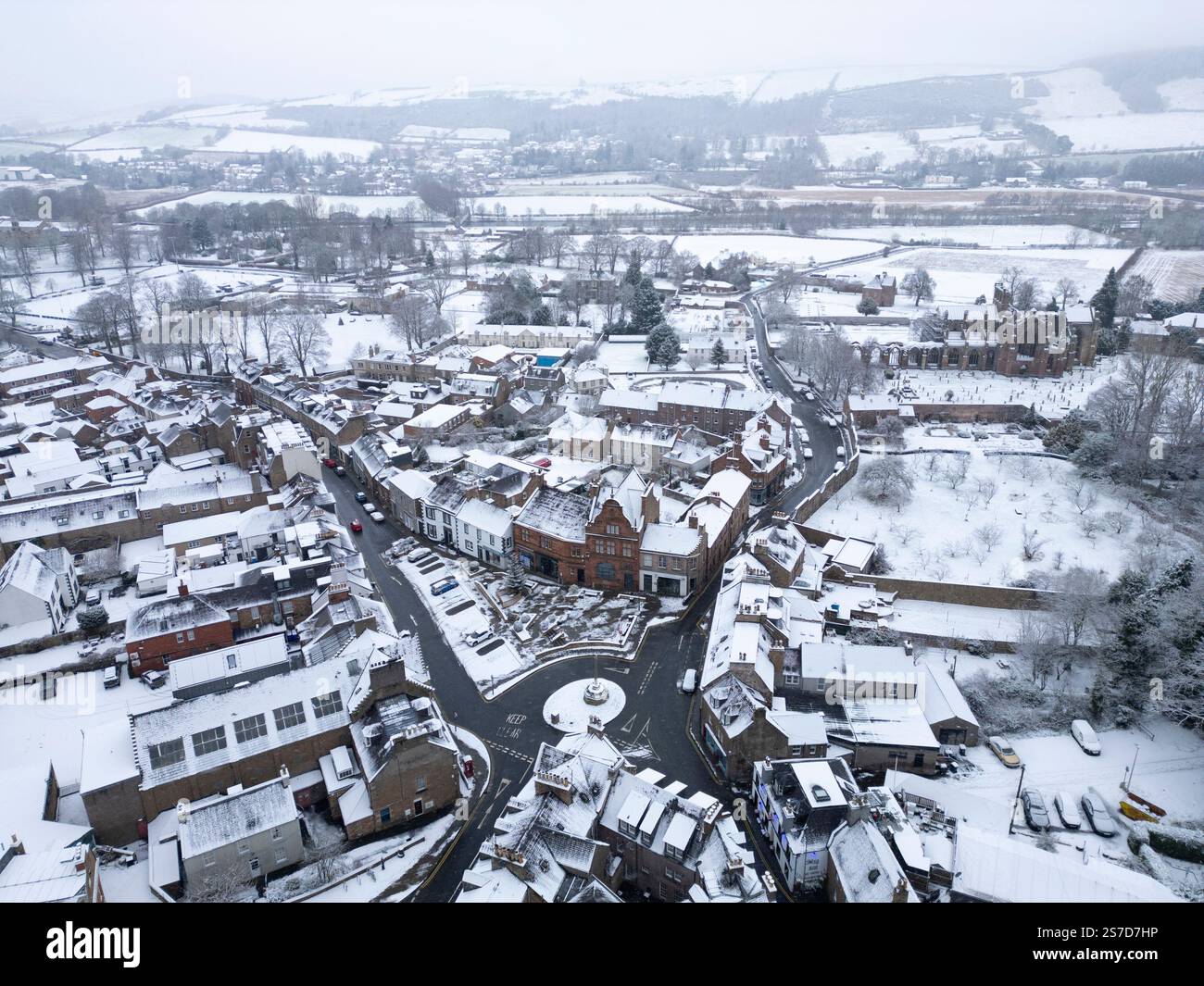Aerial view of Melrose town centre in the snow in Scottish Borders ...