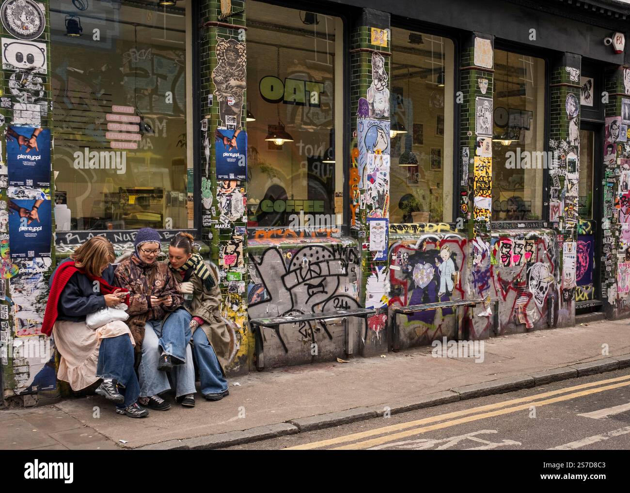 Three girls enjoying their Saturday, their phones and social media, blending nicely into the ...