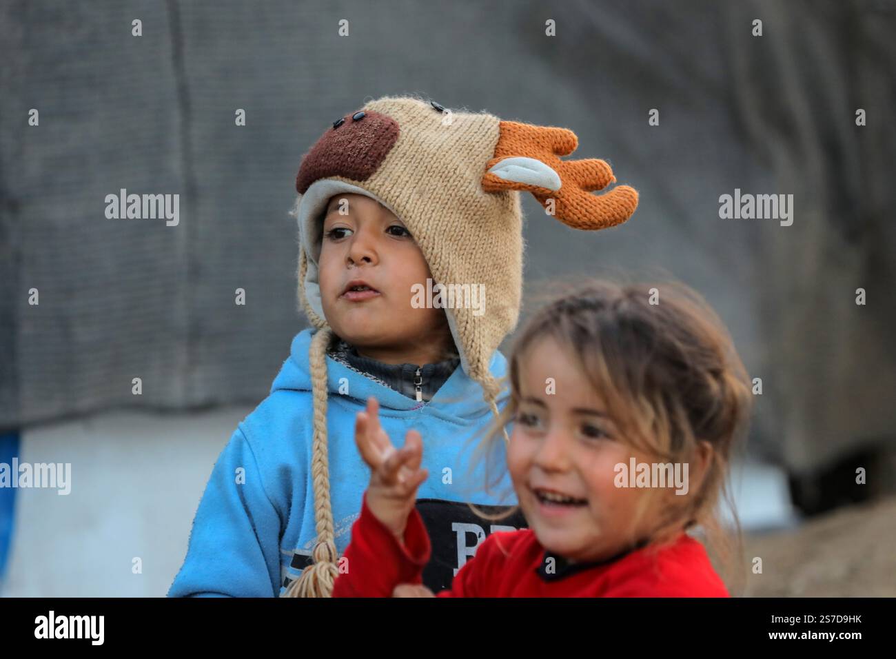 Gaza. 18th Jan, 2025. Displaced Palestinian children are pictured at a ...