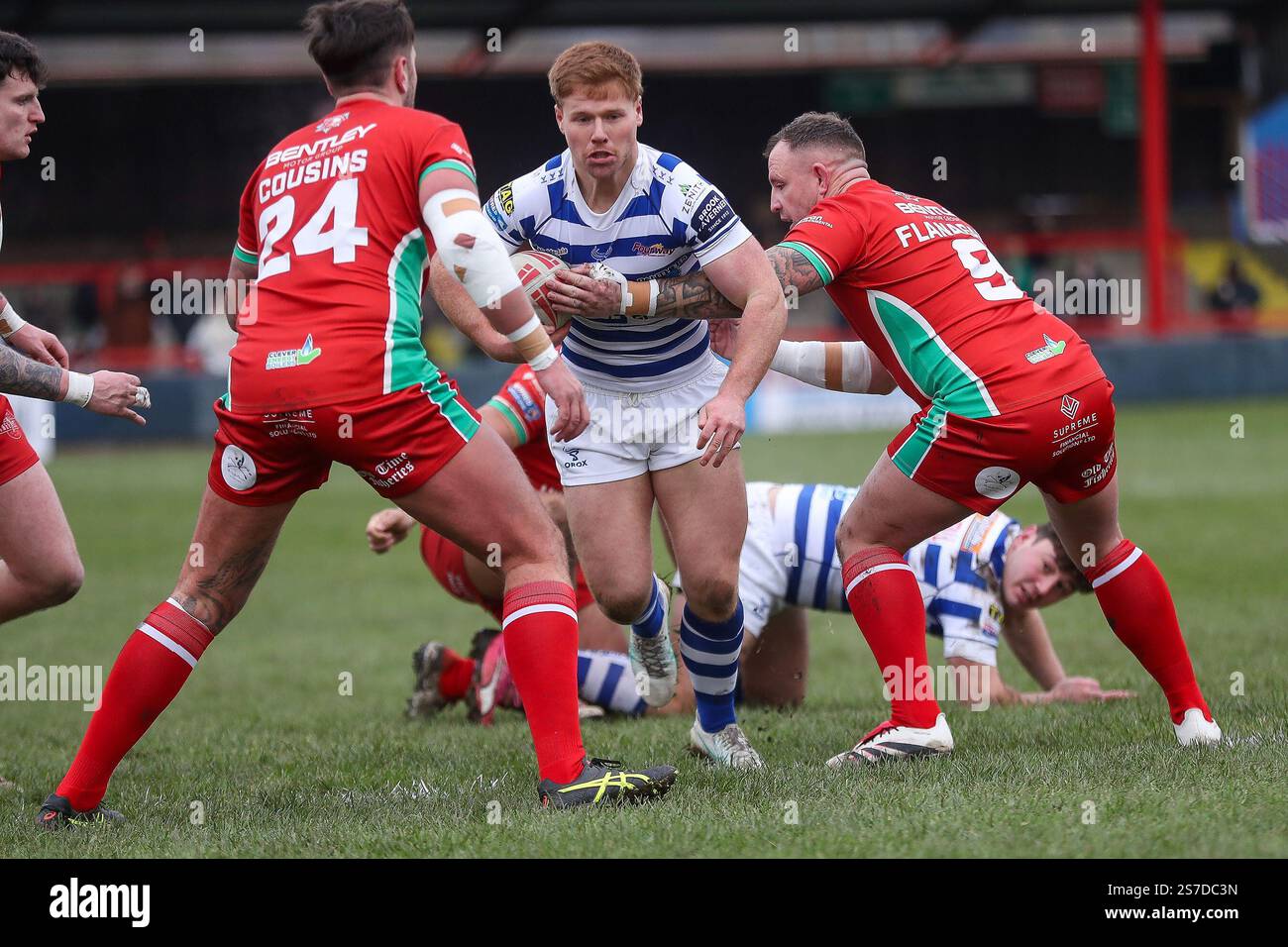 Keighley, UK. 19th Jan, 2025. Tom Inman of Halifax is surrounded by ...