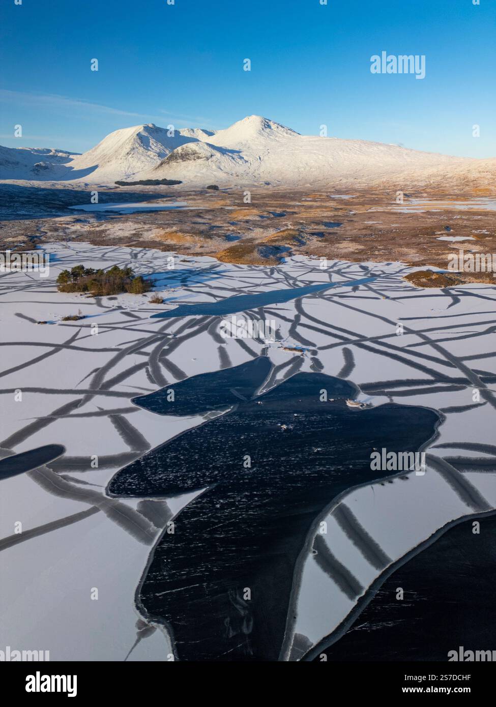 Aerial view from drone of frozen winter landscape of Rannoch Moor ...