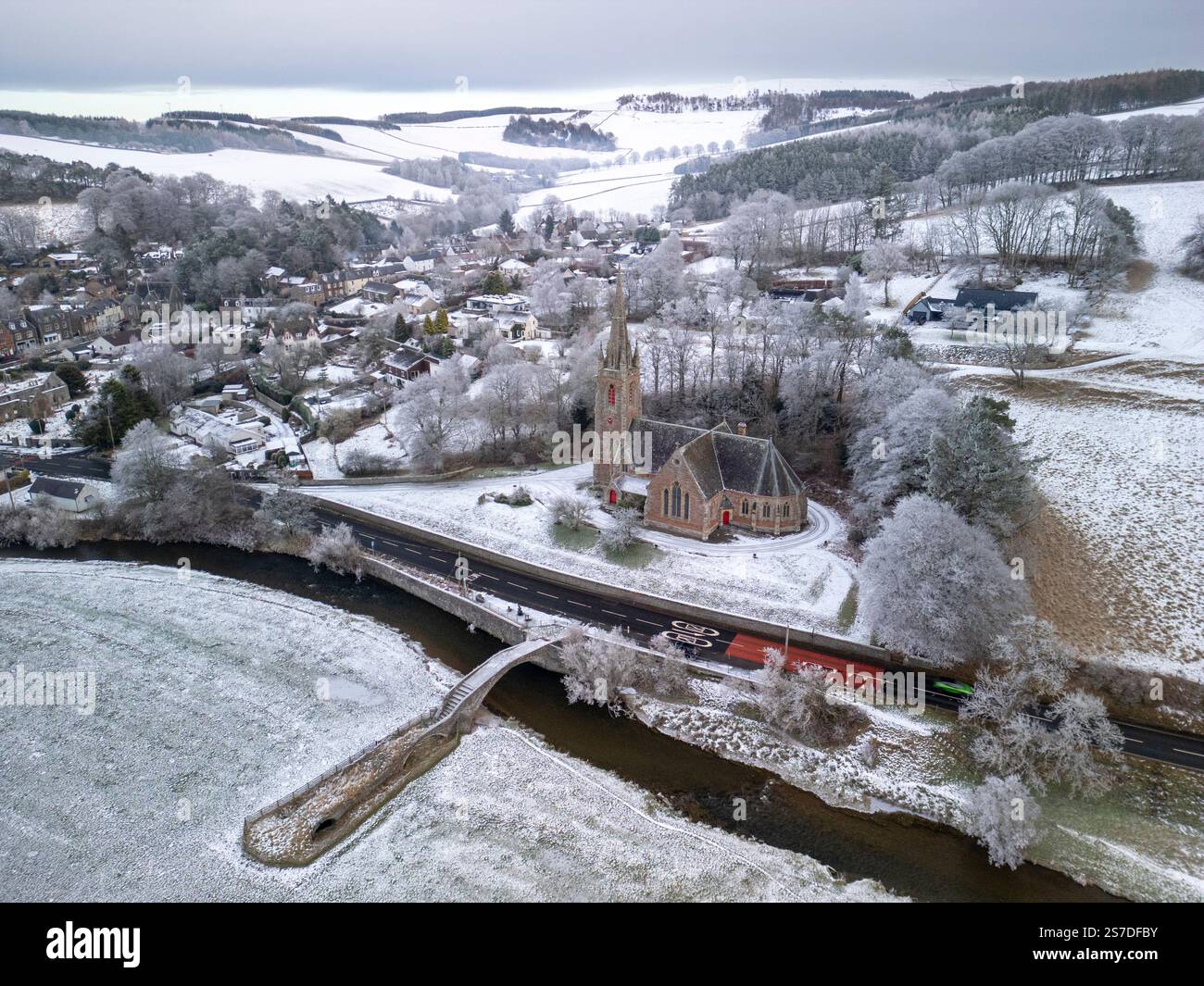 Aerial view of village of snow covered Stow in Scottish Borders in ...