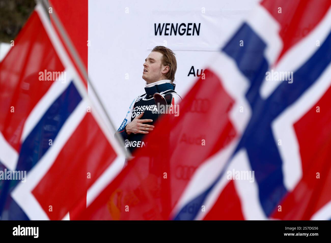 Norway's Atle Lie McGrath listens to the national anthem as he stands ...