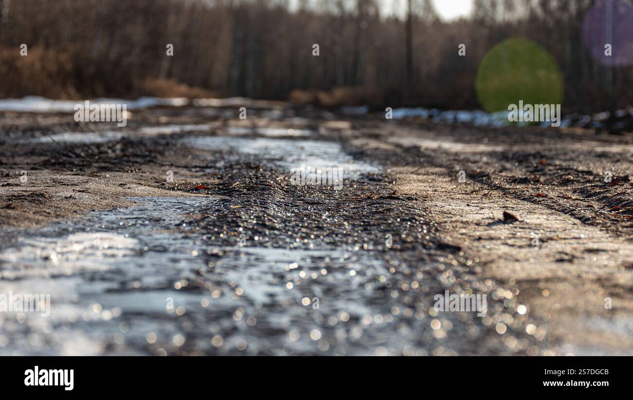 abstract frozen ice texture on muddy swamp road, winter Stock Photo - Alamy