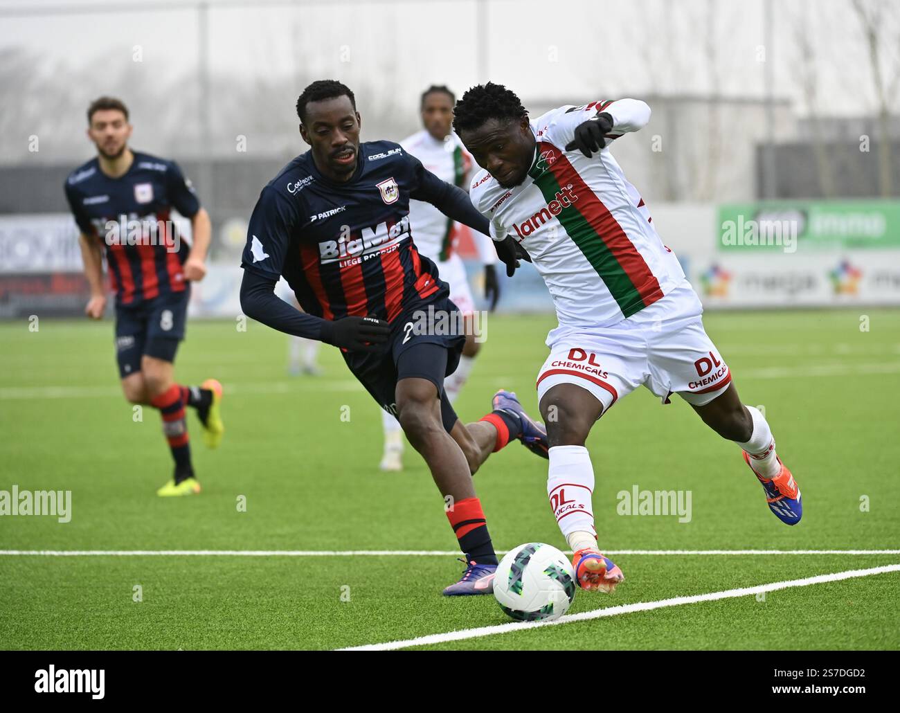 Liege's Jeremie Lioka Lima and Essevee's Joseph Opoku fight for the ...