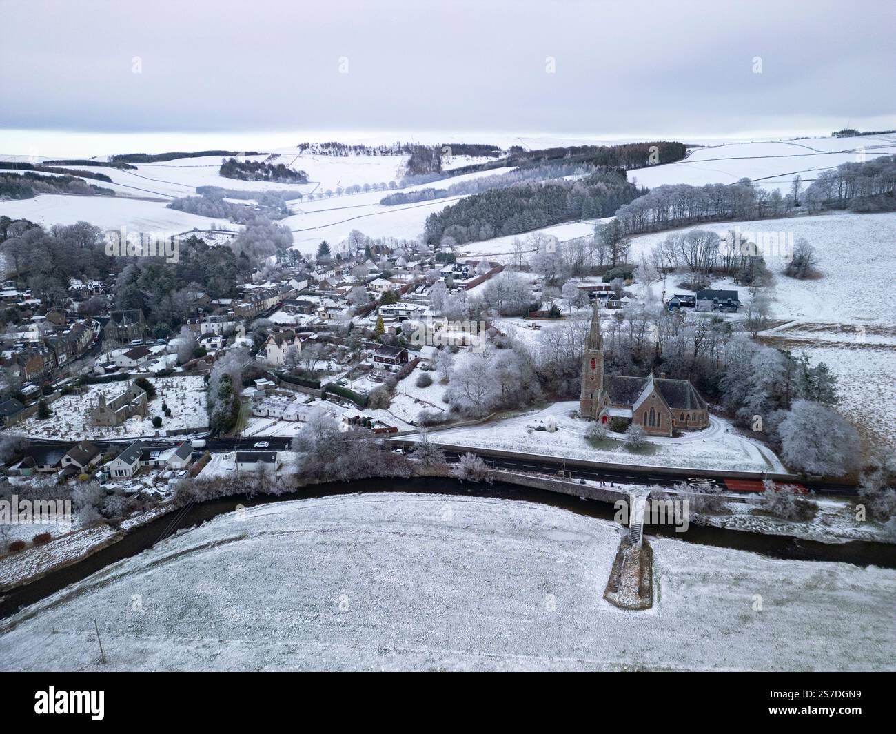 Aerial view of village of snow covered Stow in Scottish Borders in ...