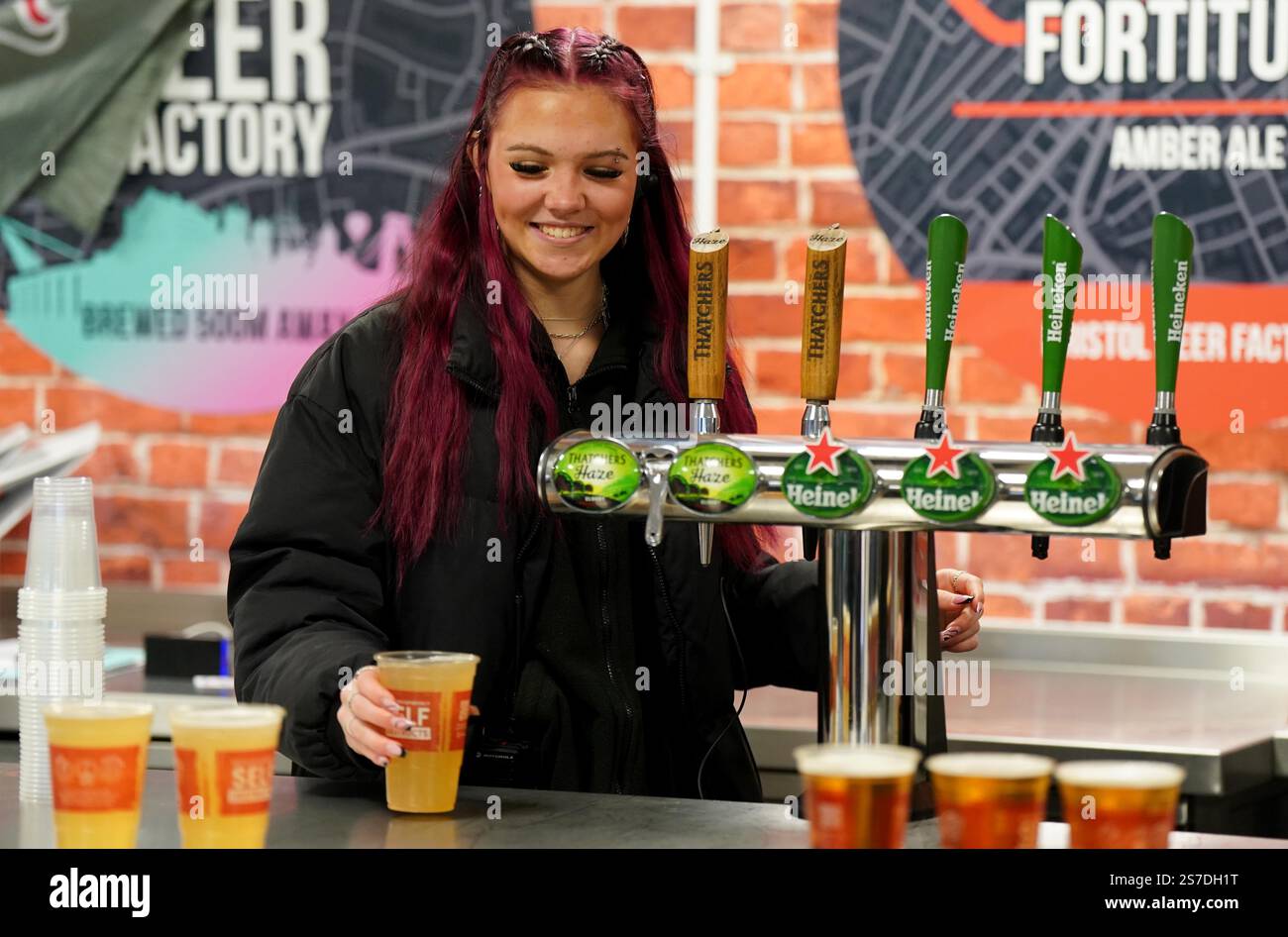 Staff pouring pints ahead of the Barclays Women's Championship match at ...
