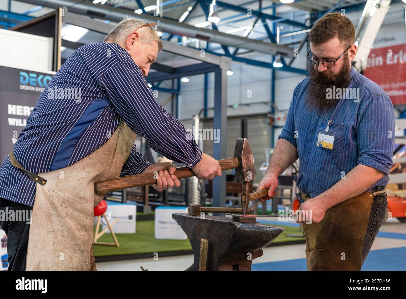 19 January 2025, Brandenburg, Cottbus: Employees of a forging company ...