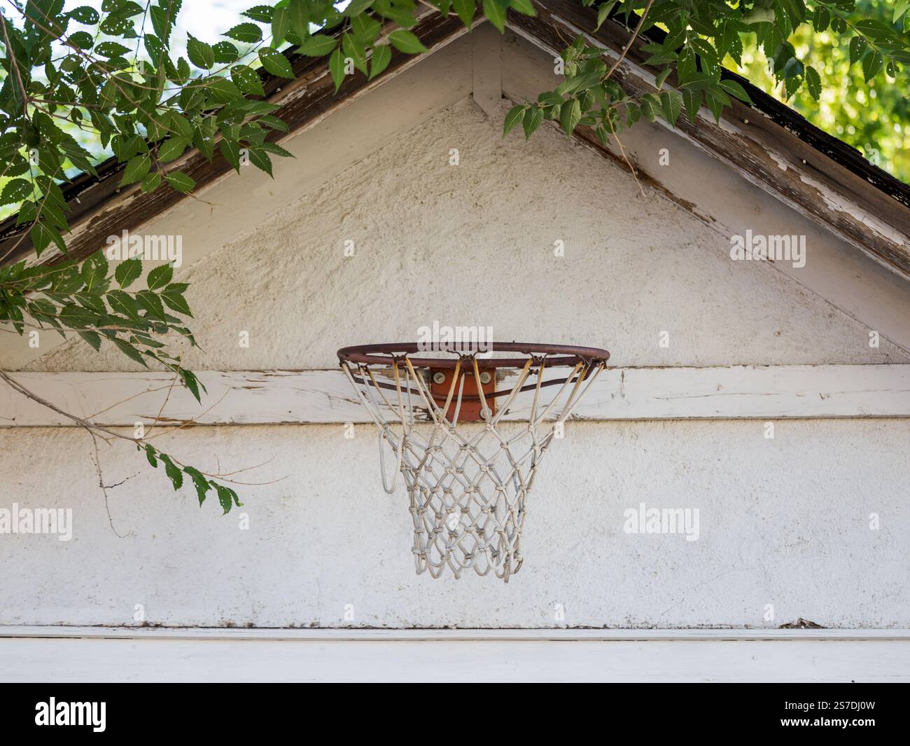 Basketball Hoop at Home on Building Stock Photo - Alamy