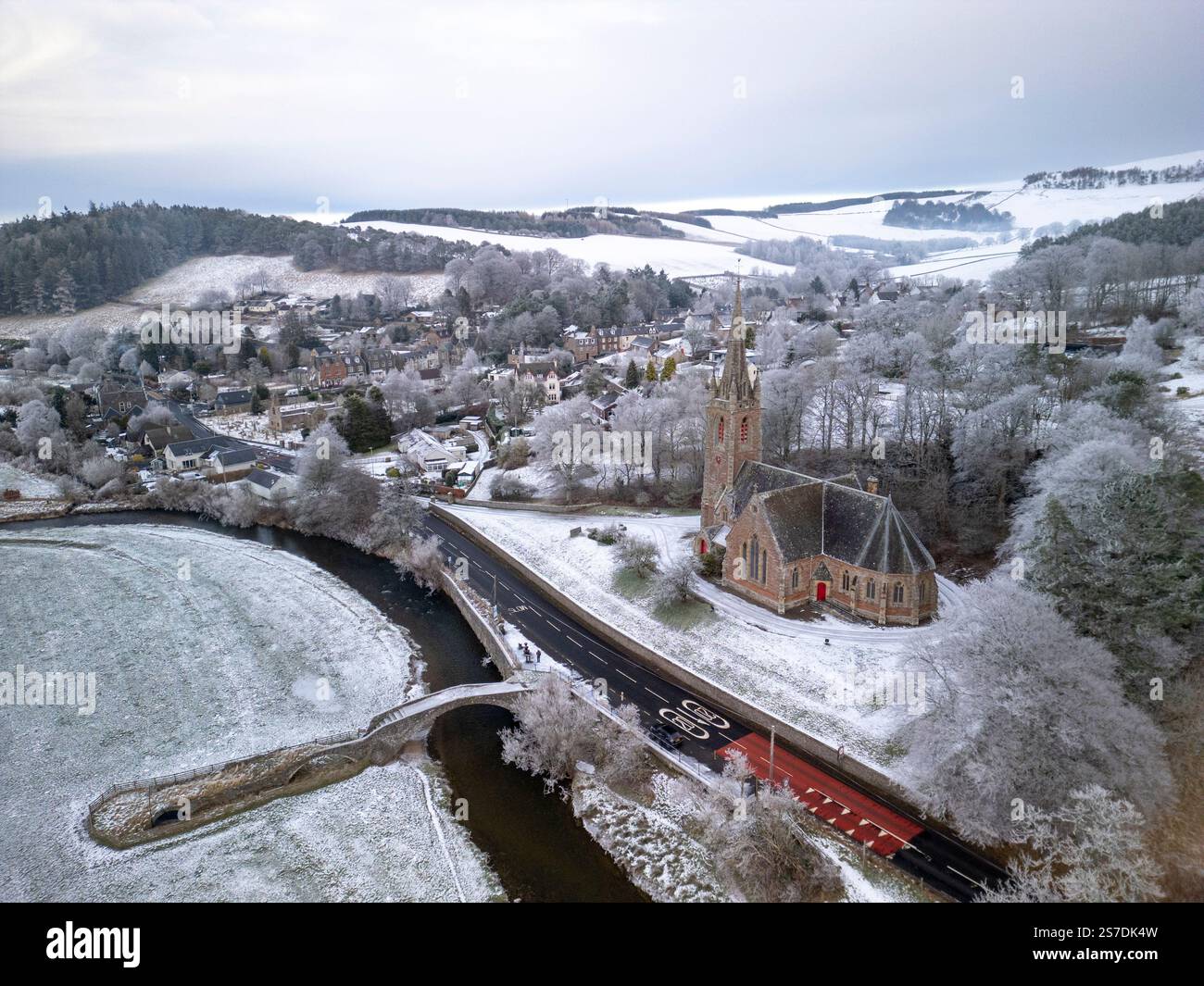 Aerial view of St Mary of Wedale church in village of snow covered Stow ...