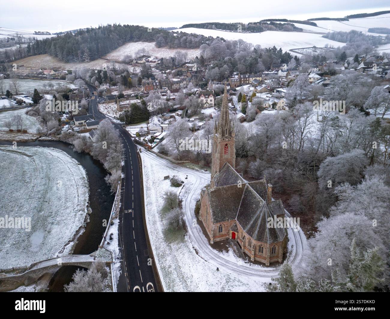 Aerial view of St Mary of Wedale church in village of snow covered Stow ...