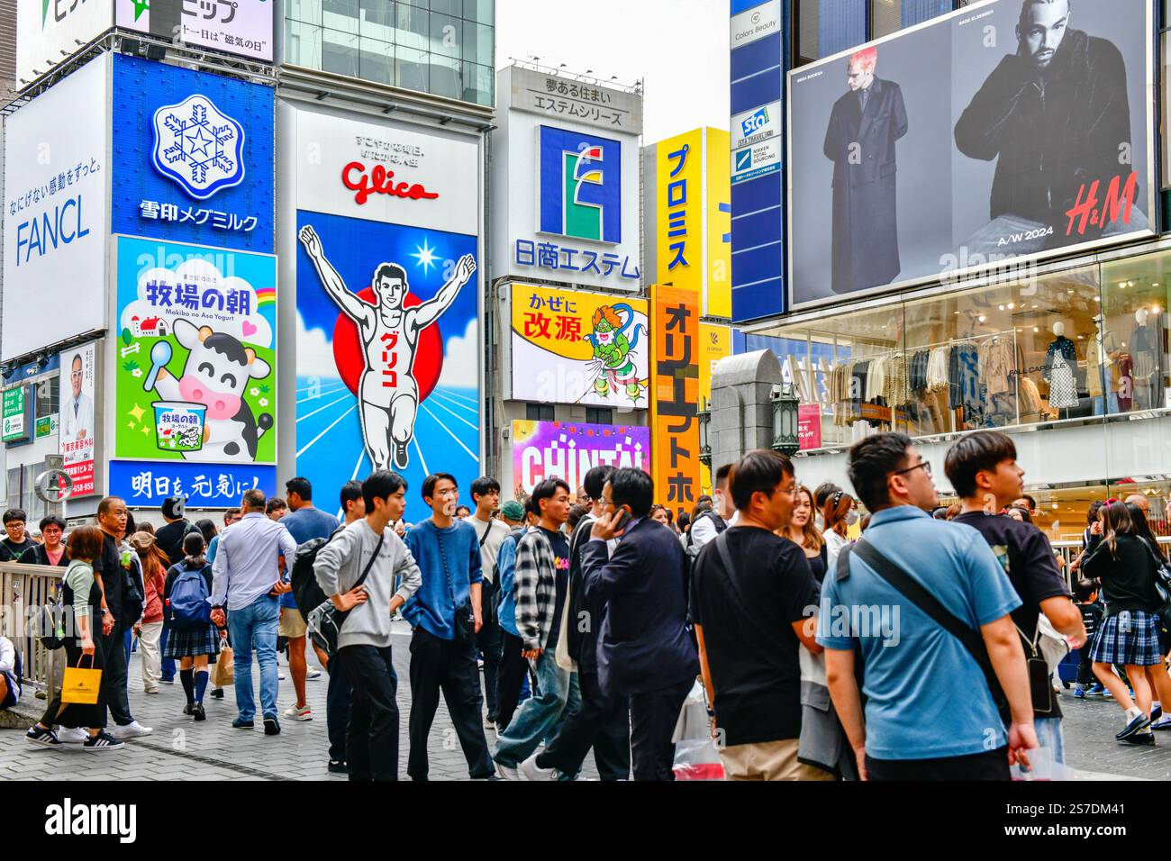 Osaka, Japan- Oct24 , 2024 : Shopping area at Dotonbori at evening of the famous Glico Running ...