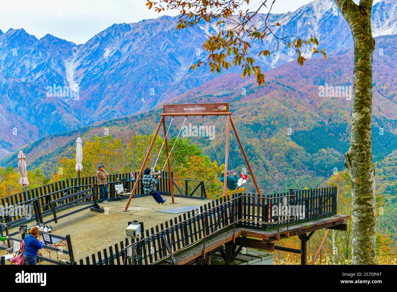 Nagano, Japan – Oct 27, 2024: Views of the Japan Alps and a ride on the Yoo Hoo! Swing for a ...