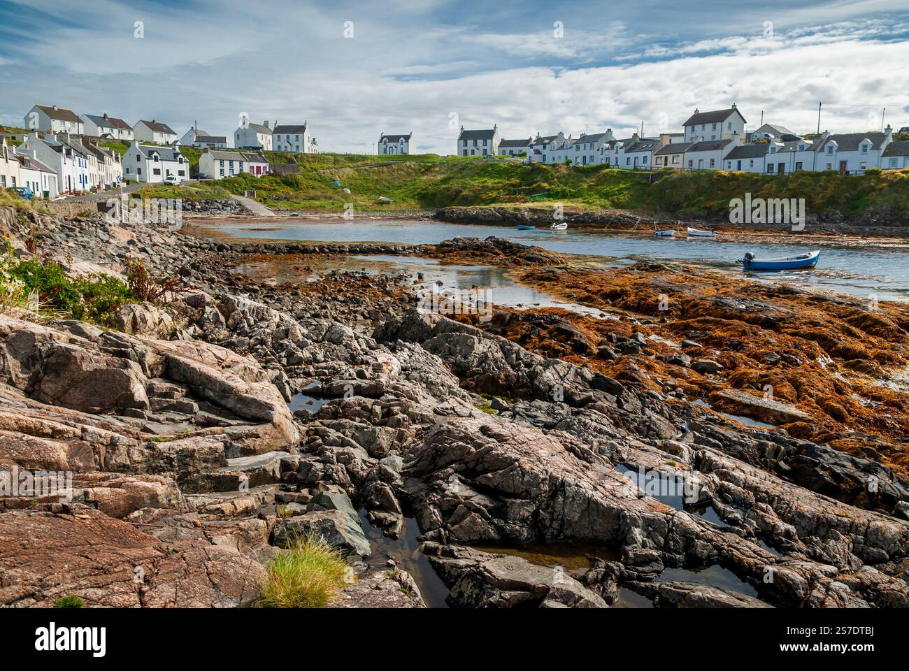 Portnahaven harbour viewed from the ocean side, Islay, Scotland Stock ...