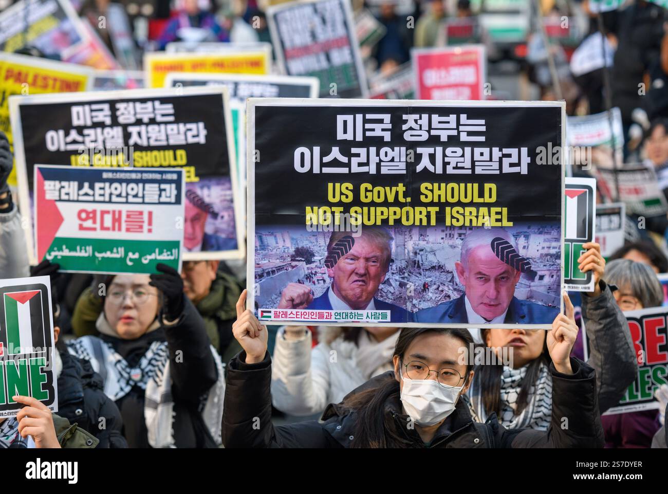Seoul, South Korea. 19th Jan, 2025. Pro-Palestinian protesters hold ...