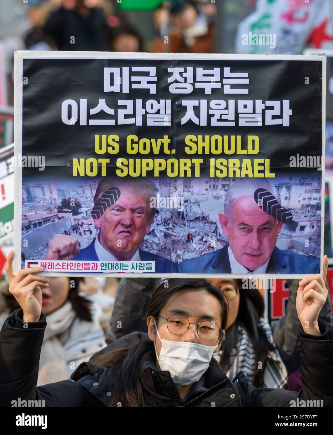 Seoul, South Korea. 19th Jan, 2025. A Pro-Palestinian protester holds a ...
